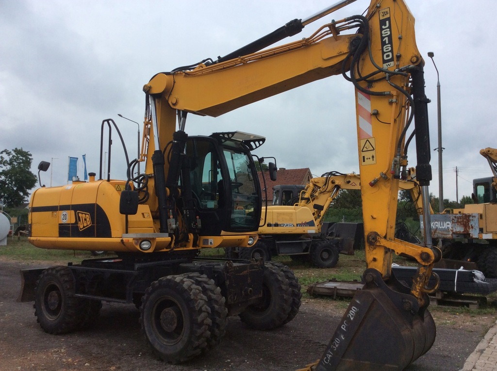 Koparka kołowa JCB JS 160 W - 7426455288 - oficjalne archiwum Allegro